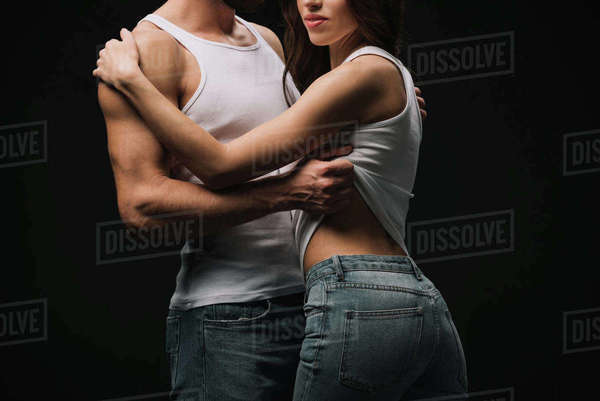 Cropped View Of Man Hugging And Undressing Girl Isolated On Black