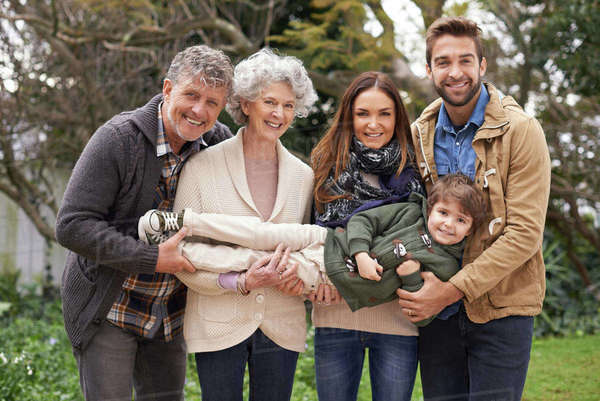Happy family, portrait and grandparents with parents and child in a ...