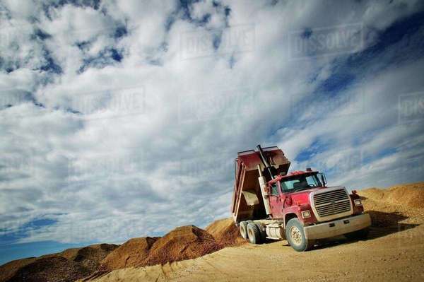 Dump Truck Unloading - Royalty-free Stock Photo | Dissolve