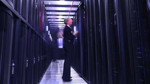 People working in computer server room data center - HD Royalty-free ...