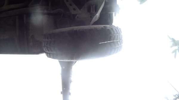 Point of view from ground under Humvee while Black Hawk helicopter ...
