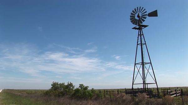 Medium shot of a windmill turning in the breeze. - HD Royalty-free ...