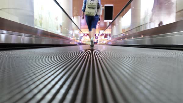 Moving walkway at the airport, also known as an autowalk, moving ...