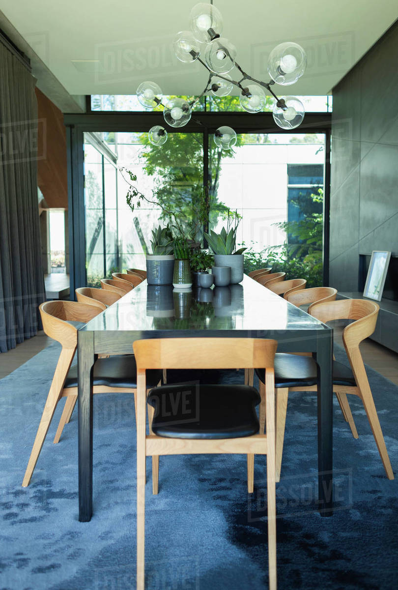 Mid-century modern dining room table - Stock Photo - Dissolve