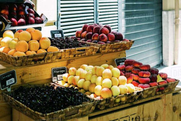 Fruit stall at market - Royalty-free Stock Photo | Dissolve