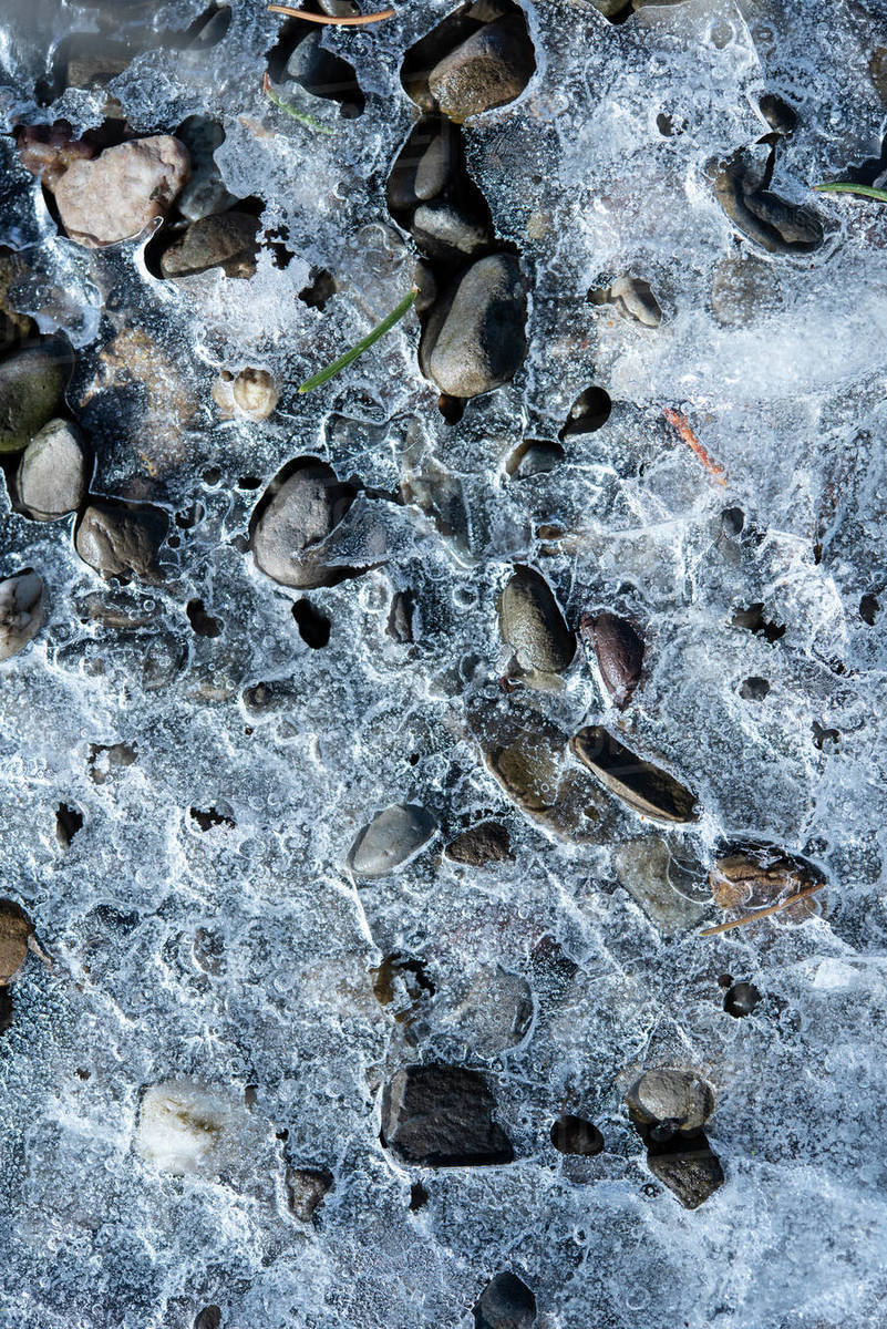 Ice over pebbles - Royalty-free Stock Photo | Dissolve