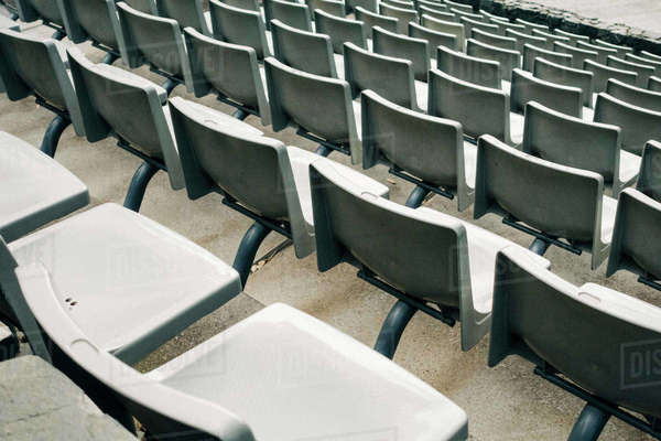 Seats in stadium - Stock Photo - Dissolve