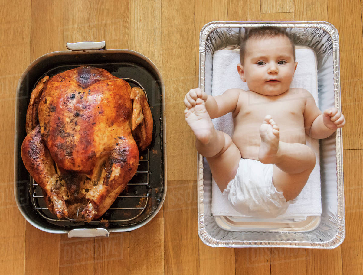 Baked turkey and baby girl (2-5 months) in baking dish - Royalty-free ...