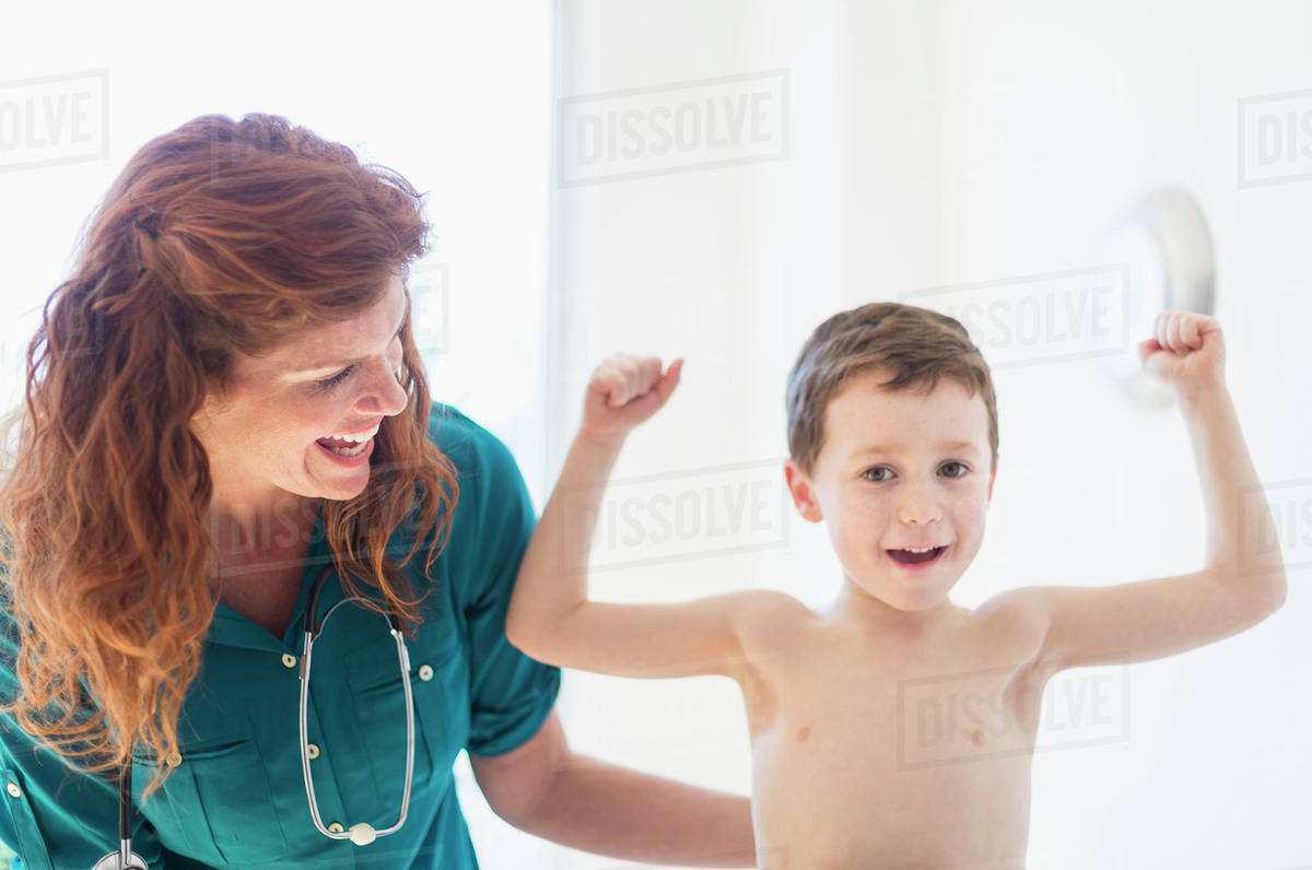 Boy (6-7) undergoing medical exam - Royalty-free Stock Photo | Dissolve