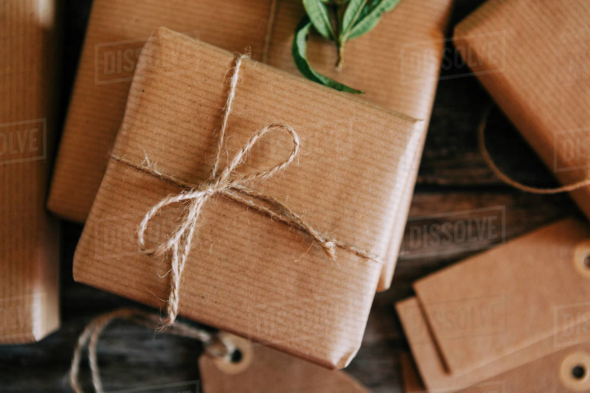 Presents wrapped in brown paper and string - Royalty-free Stock Photo ...