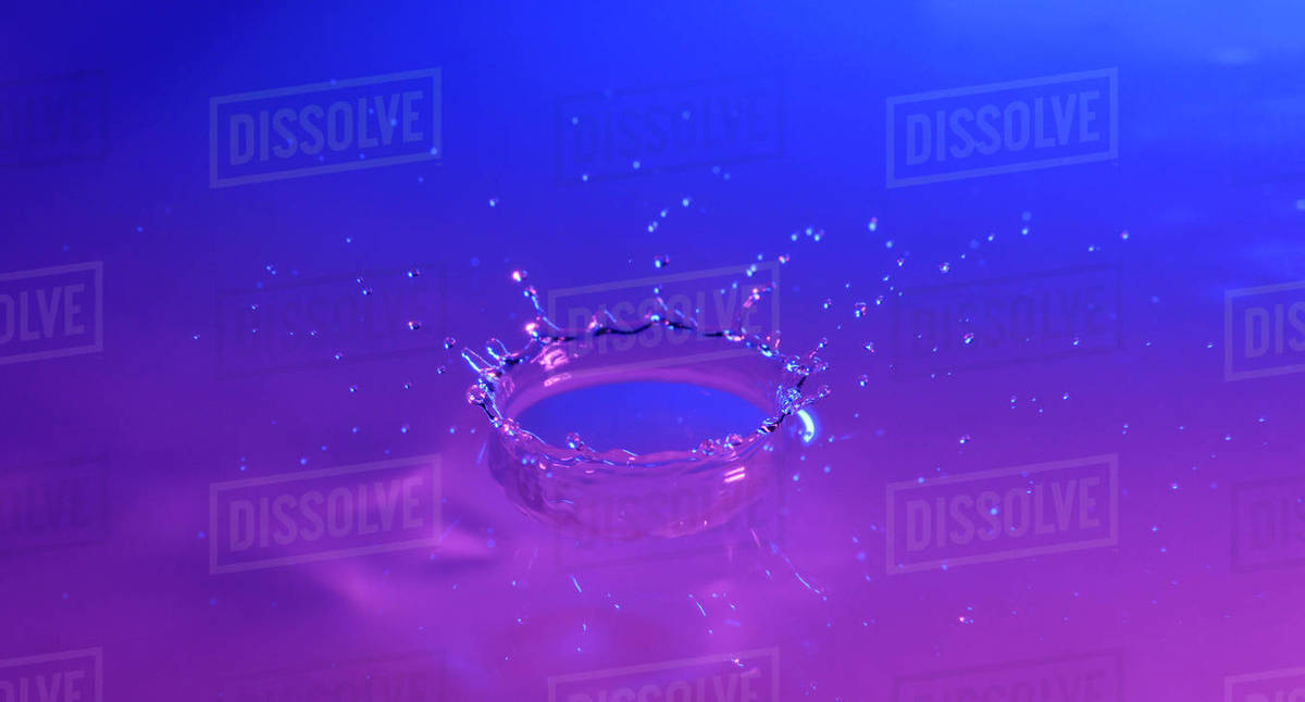 Purple and blue splashing water - Royalty-free Stock Photo | Dissolve