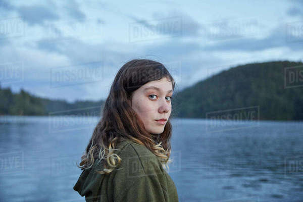 Portrait of girl by lake - Royalty-free Stock Photo | Dissolve