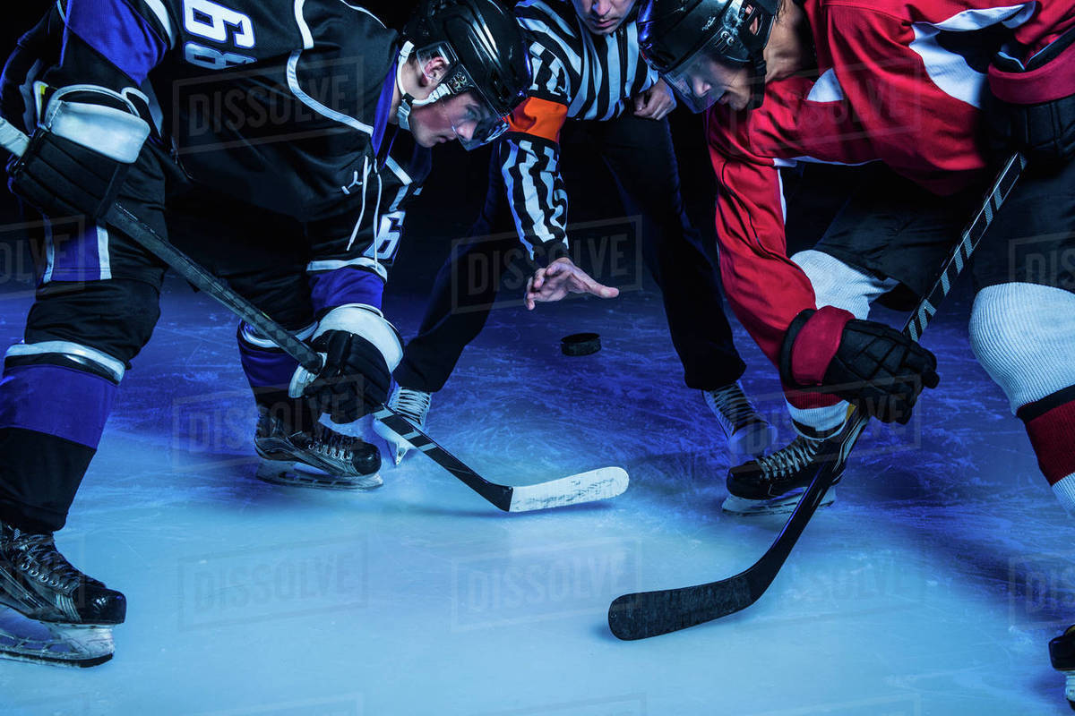 Hockey players and referee starting match - Royalty-free Stock Photo ...