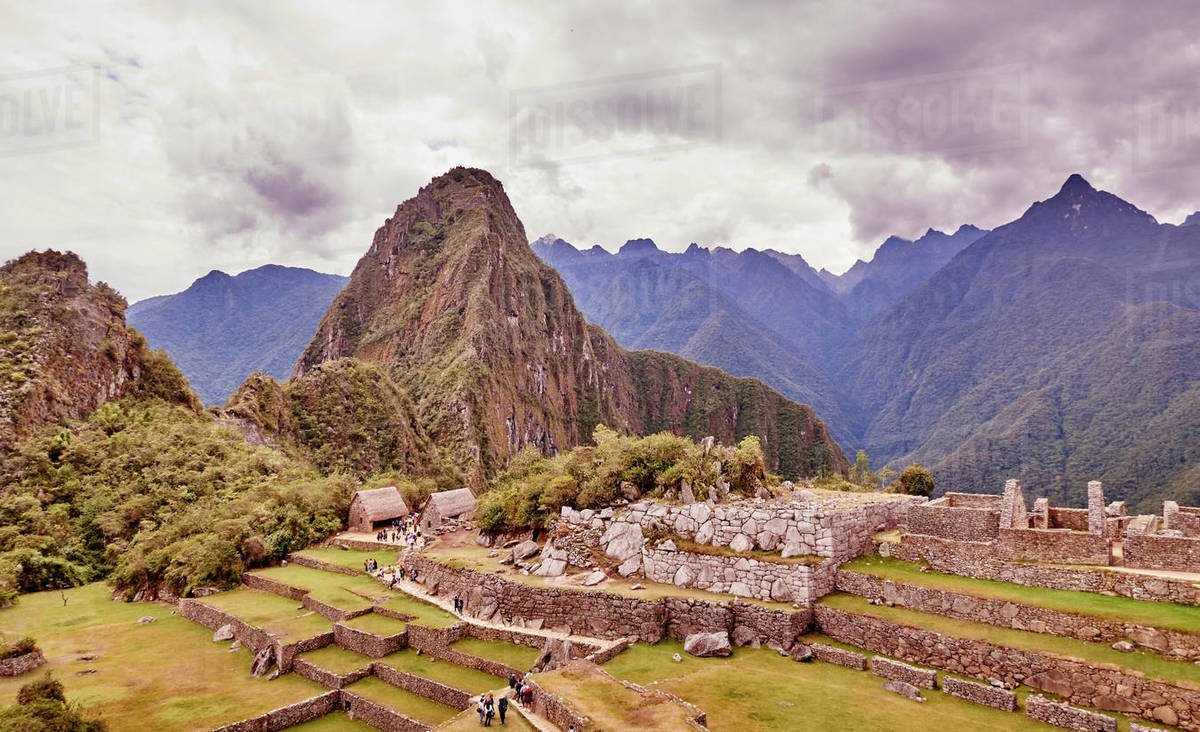 Peru, Machu Pichu, Mountain range and ruins of aztec village - Stock ...