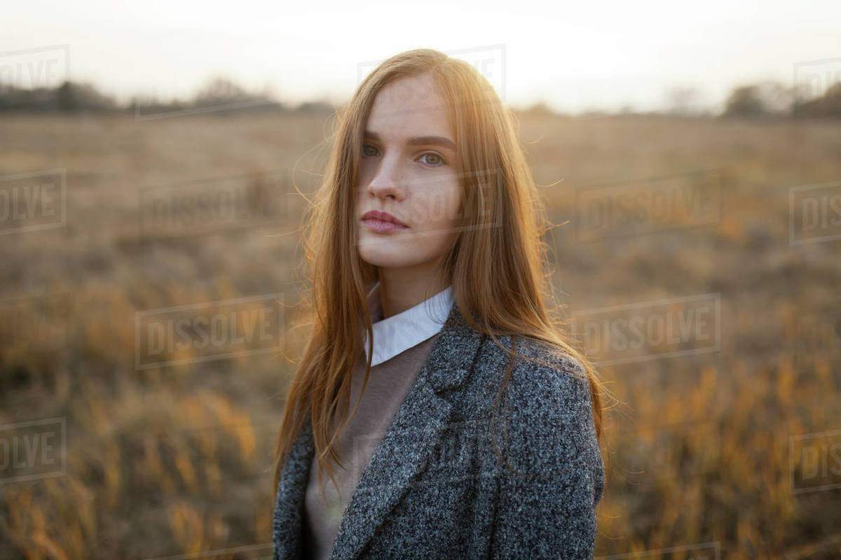 Russia, Omsk, Portrait of young woman in field - Royalty-free Stock ...