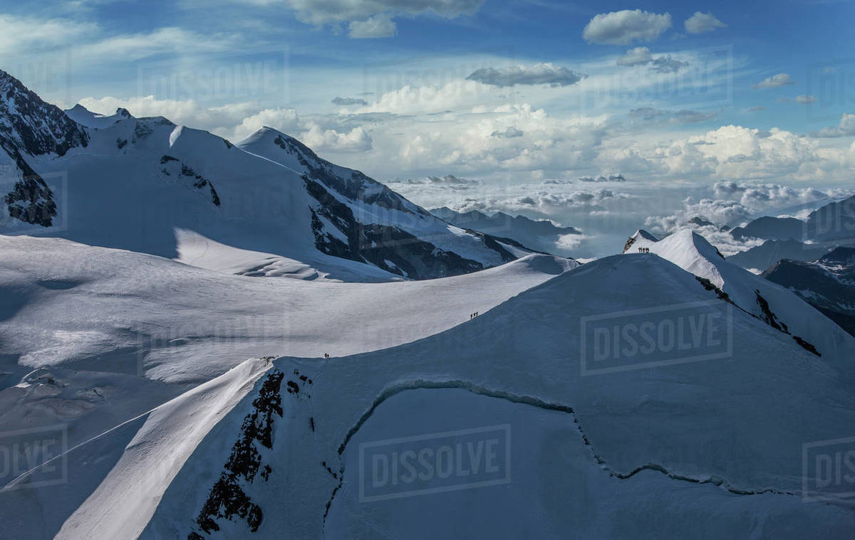 Switzerland, Monte Rosa, Climbers on mountain ridge at Monte Rosa ...