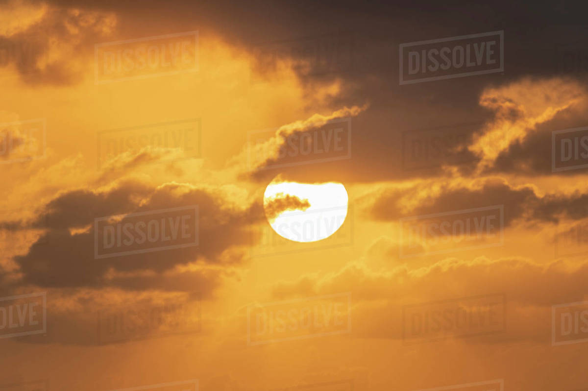 Rising sun on orange sky - Royalty-free Stock Photo | Dissolve