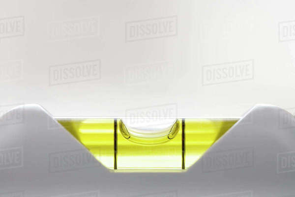 Close-up of carpenters level - Stock Photo - Dissolve