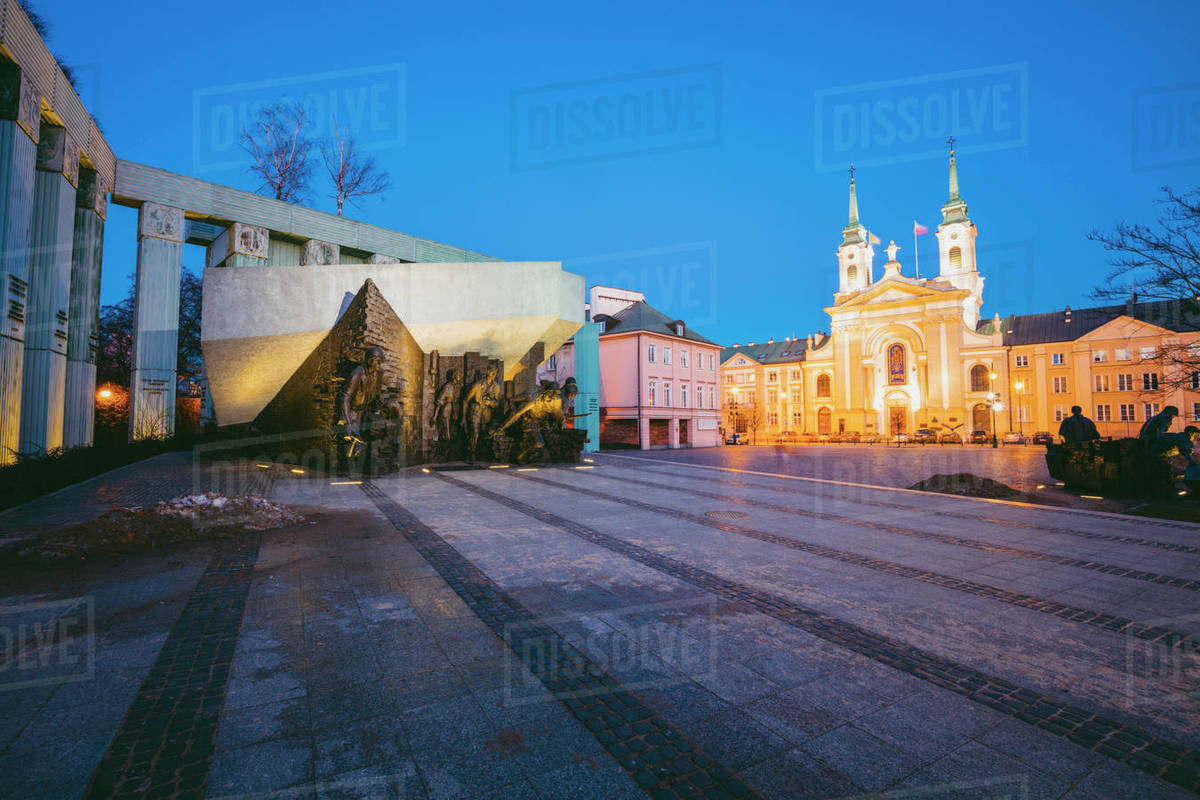 Poland, Masovia, Warsaw, Town square with World War II monument and ...