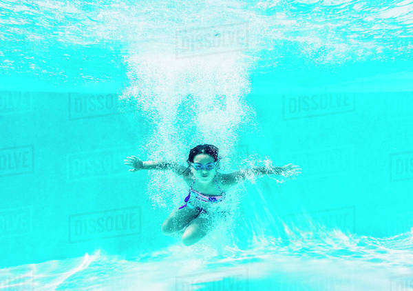 Girl ( 8-9) swimming - Royalty-free Stock Photo | Dissolve