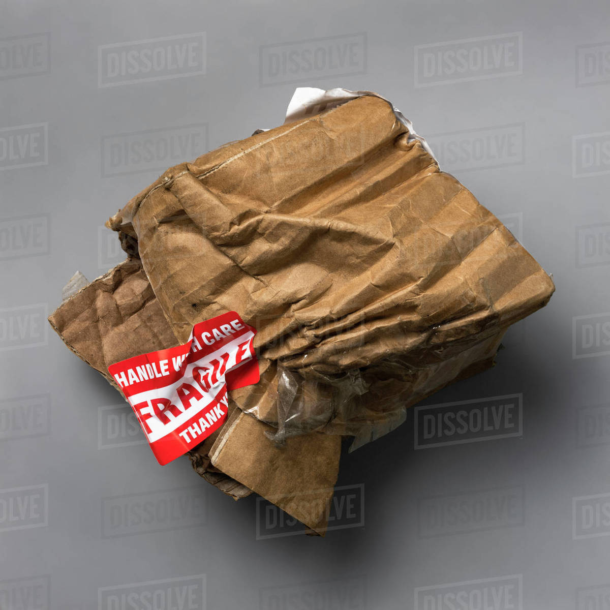 Fragile handle with care sticker on crushed package - Royalty-free ...