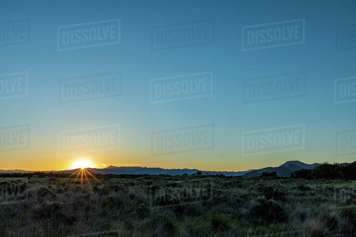 USA, Idaho, Bellevue, Sun setting over plains - Royalty-free Stock ...