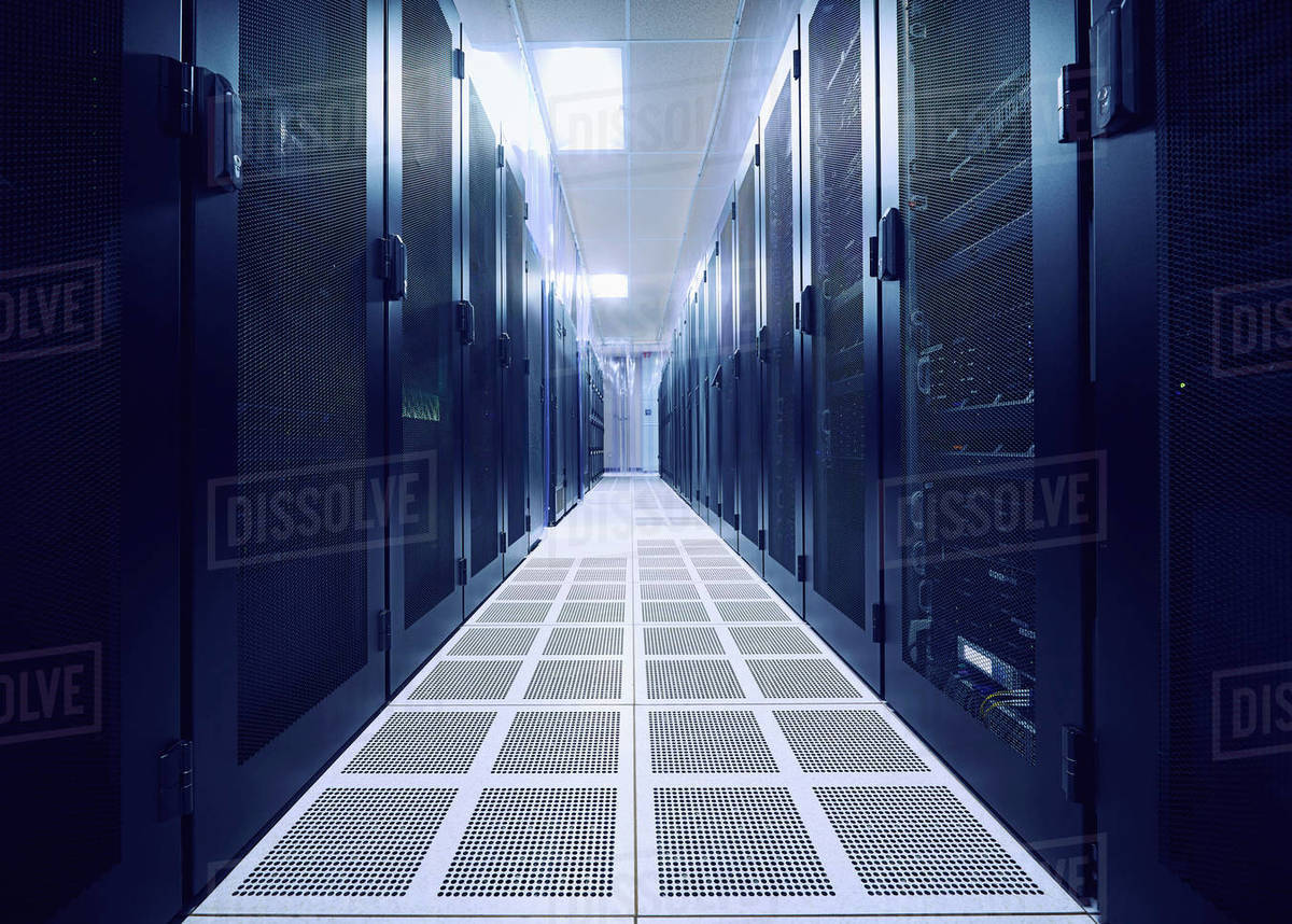 Rows of server racks in data center - Royalty-free Stock Photo | Dissolve