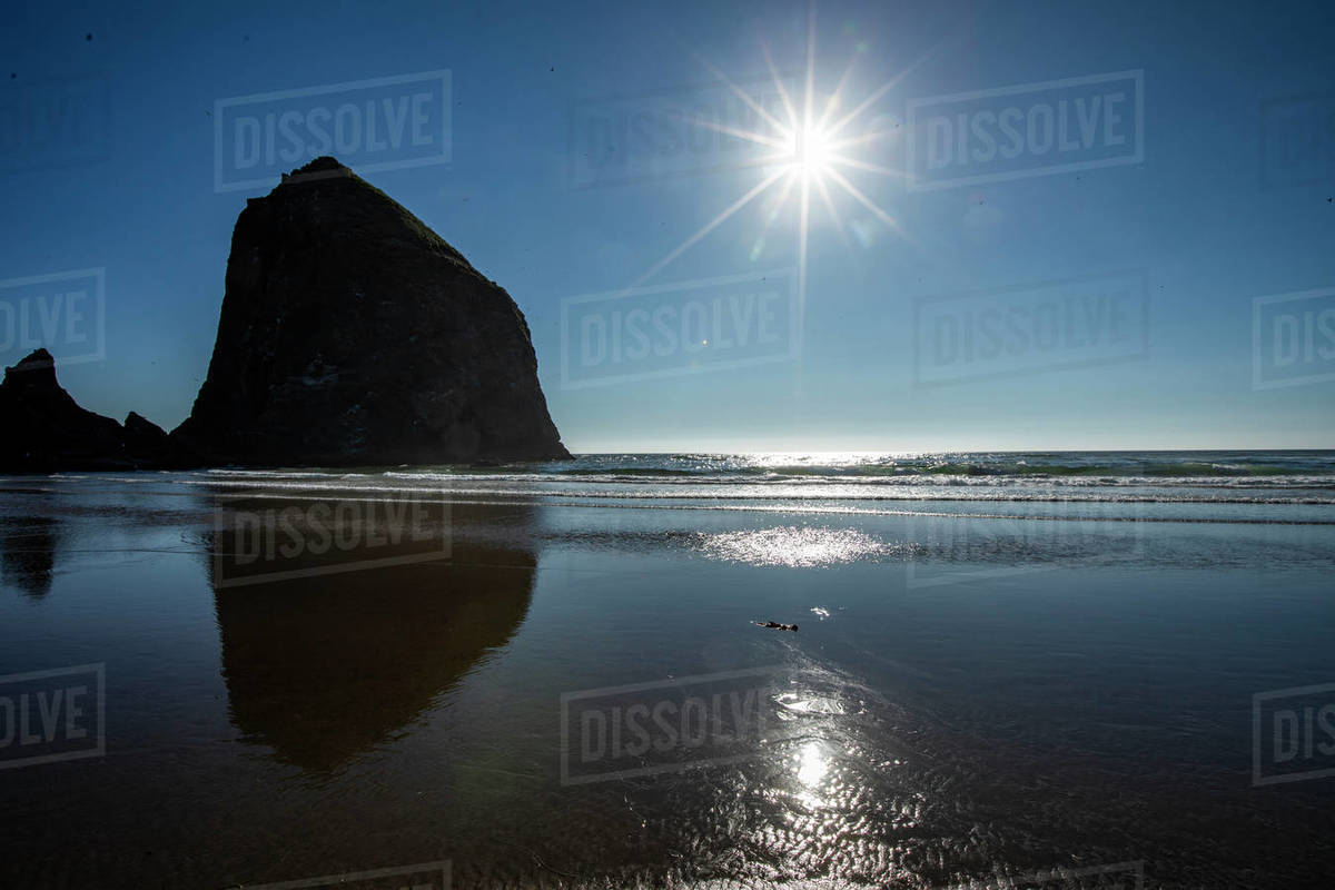 USA, Oregon, Silhouette of Haystack Rock at Cannon Beach - Royalty-free ...