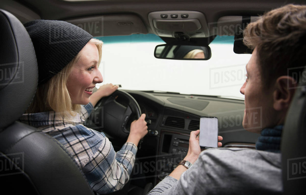 Couple driving car - Stock Photo - Dissolve