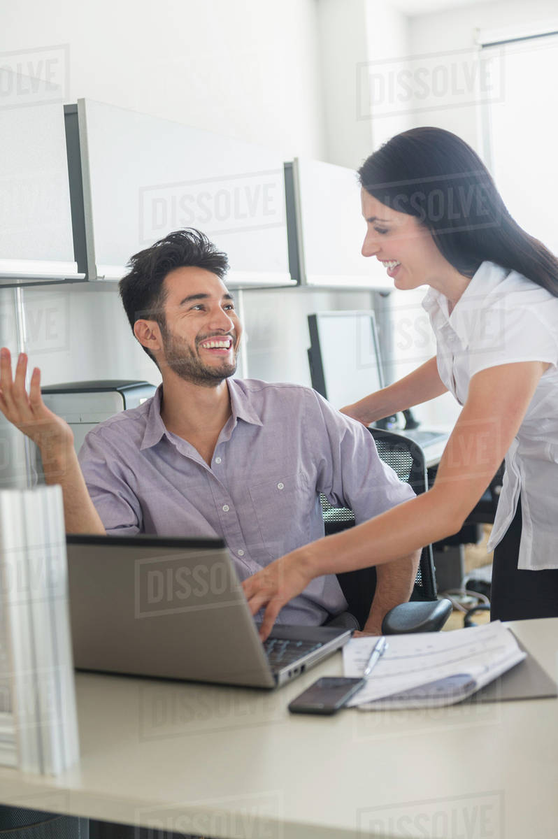 Business man and woman at work in office - Stock Photo - Dissolve