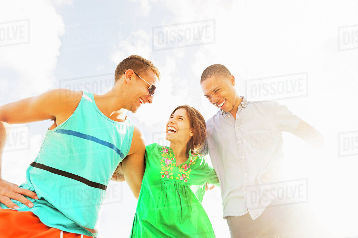 Young people having fun outdoors - Royalty-free Stock Photo | Dissolve