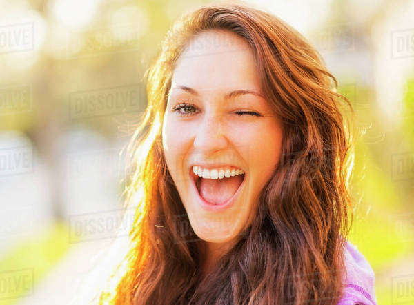 Portrait of winking woman - Royalty-free Stock Photo | Dissolve