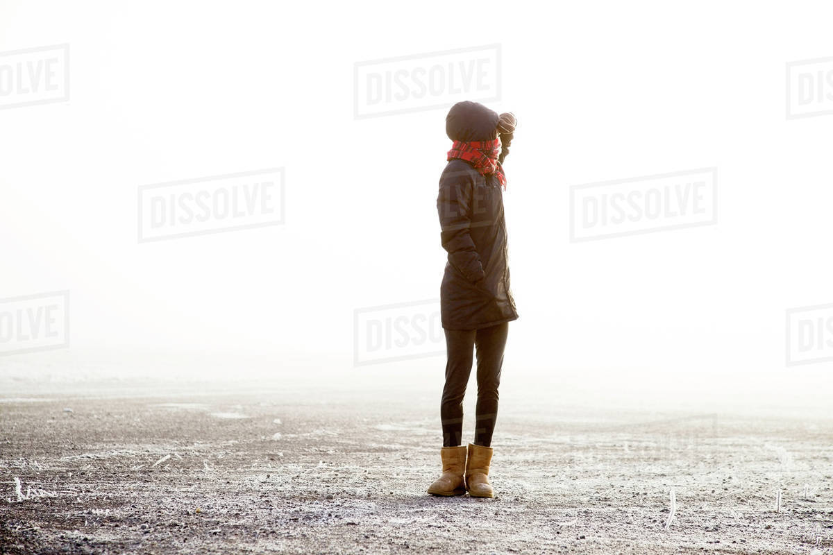 Woman wearing jacket outdoors - Royalty-free Stock Photo | Dissolve