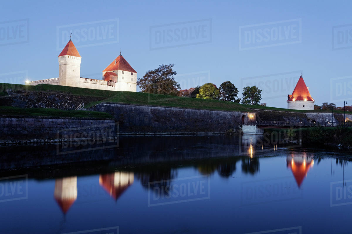 View of castle on island from river - Stock Photo - Dissolve