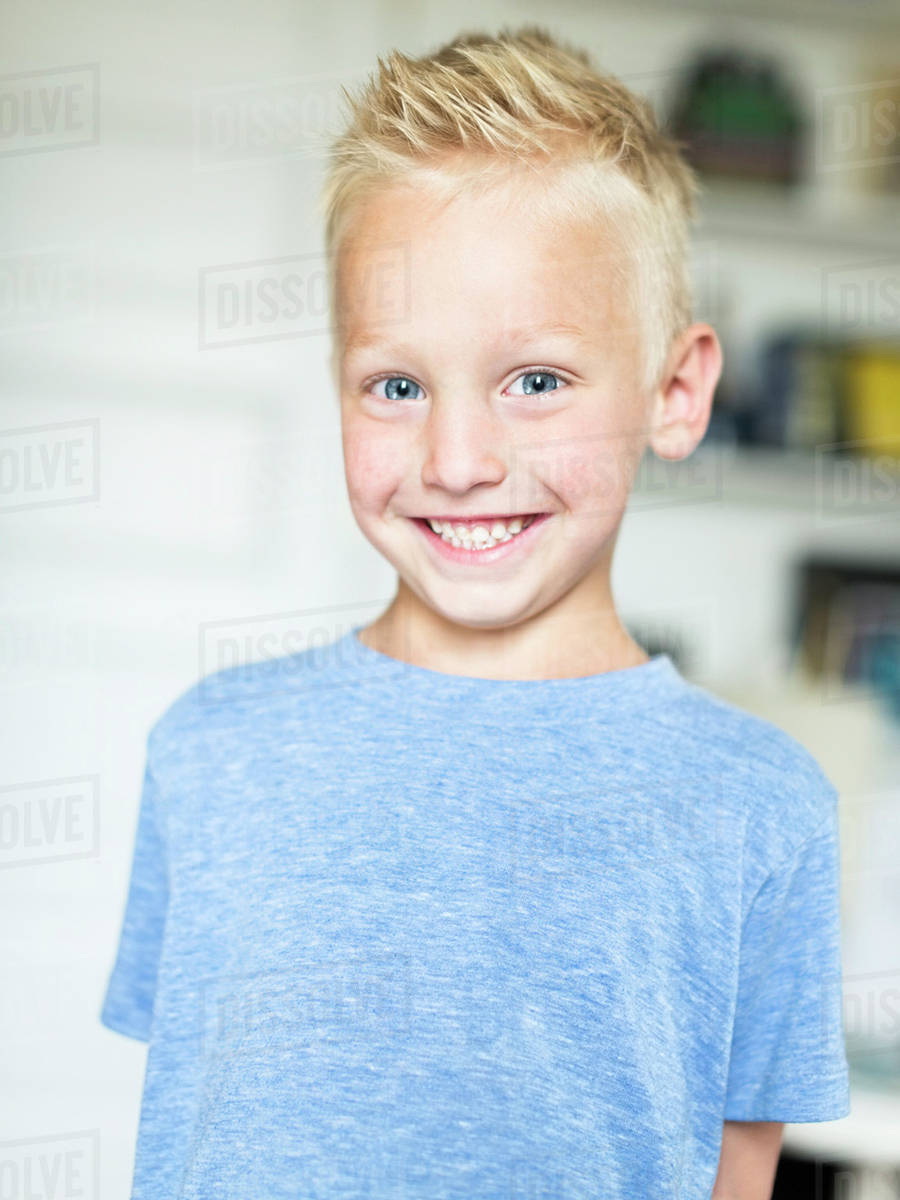Portrait of blue eyed boy (4-5) - Stock Photo - Dissolve