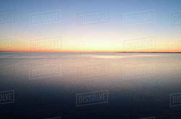 Horizon over water at dusk - Stock Photo - Dissolve
