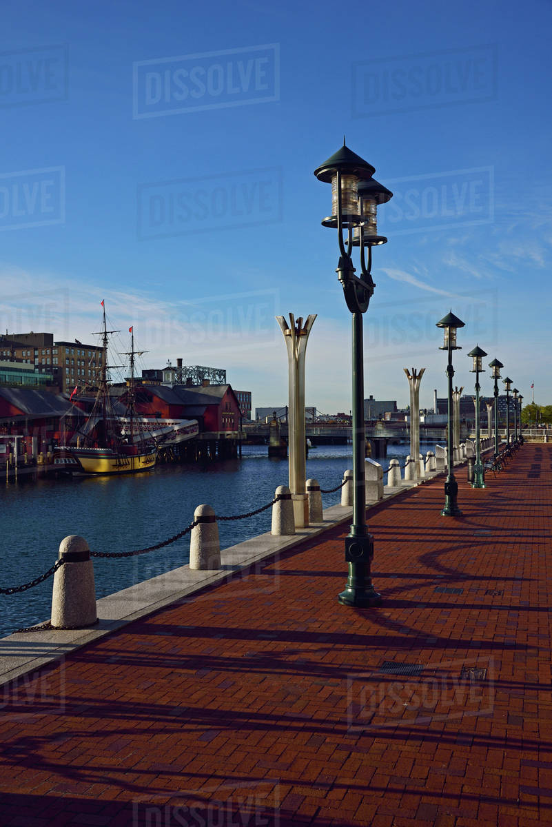 Pedestrian walkway at waterfront in sunlight - Royalty-free Stock Photo ...