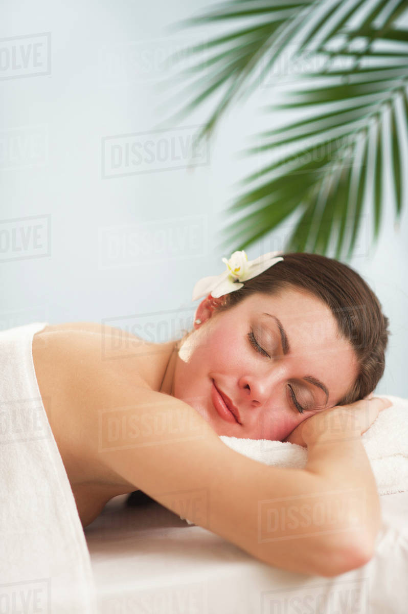 Woman relaxing in spa - Stock Photo - Dissolve