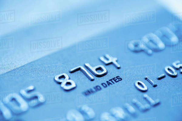 Detail of credit card, studio shot - Royalty-free Stock Photo | Dissolve