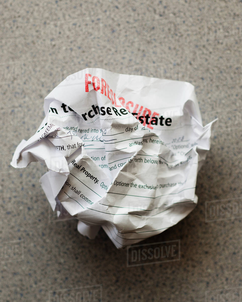 Studio shot of crumpled document - Royalty-free Stock Photo | Dissolve