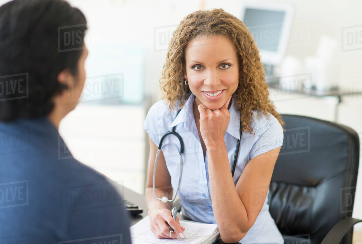 Doctor and patient in clinic - Royalty-free Stock Photo | Dissolve