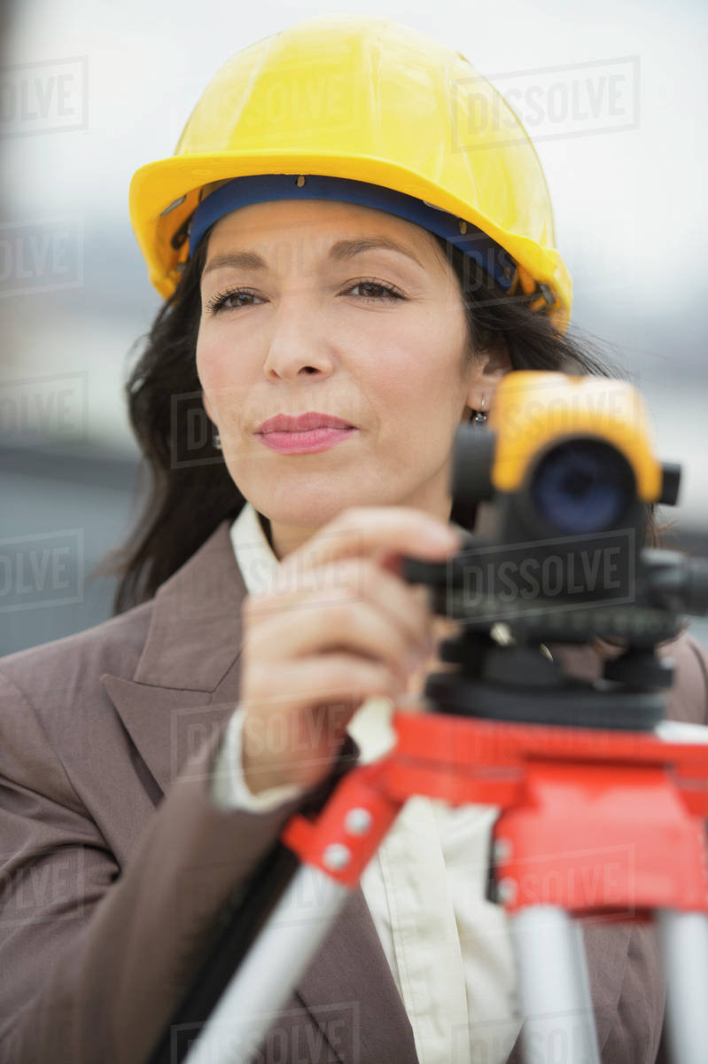Architect using theodolite - Royalty-free Stock Photo | Dissolve