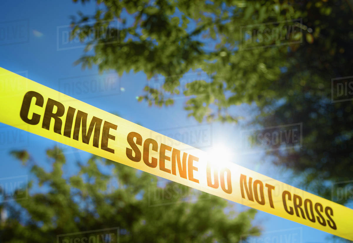 Crime scene barrier tape - Royalty-free Stock Photo | Dissolve