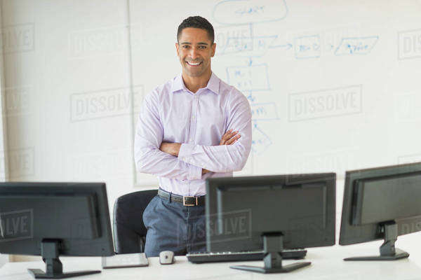 Portrait of male business executive at desk - Royalty-free Stock Photo ...