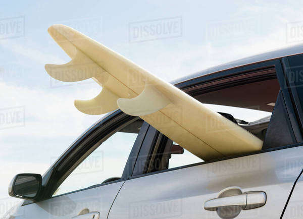 Surfboard in car - Royalty-free Stock Photo | Dissolve