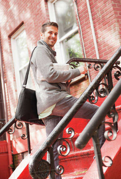 Man coming back home - Royalty-free Stock Photo | Dissolve