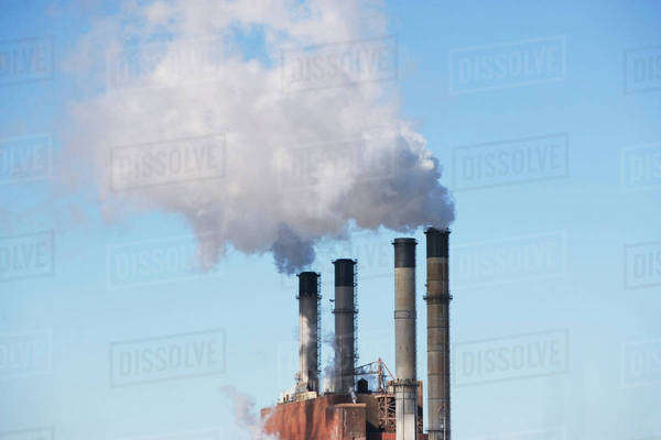 Factory chimneys - Royalty-free Stock Photo | Dissolve