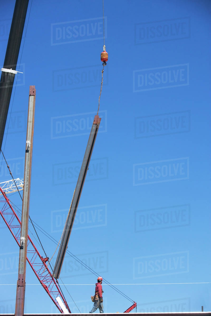 Construction worker on construction frame - Royalty-free Stock Photo ...