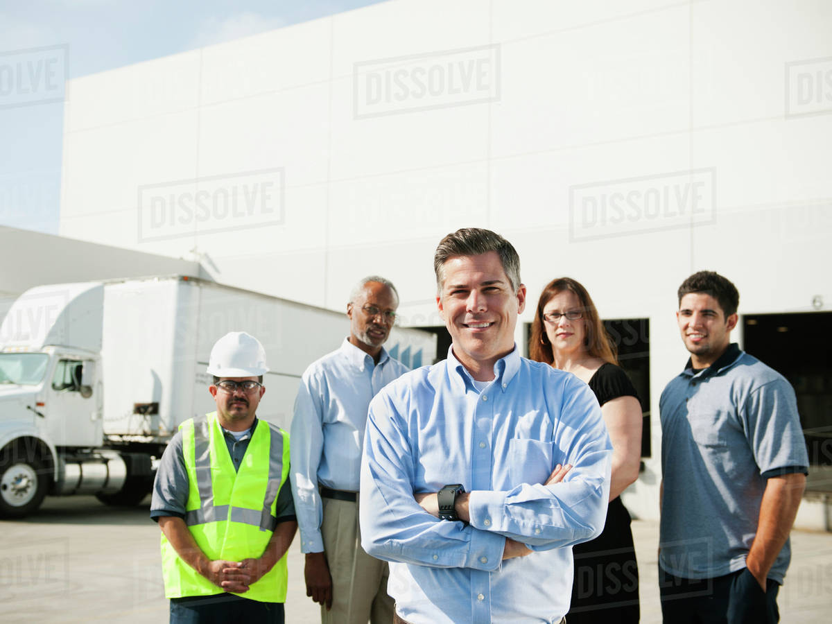 Portrait of warehouse workers and manager - Royalty-free Stock Photo ...
