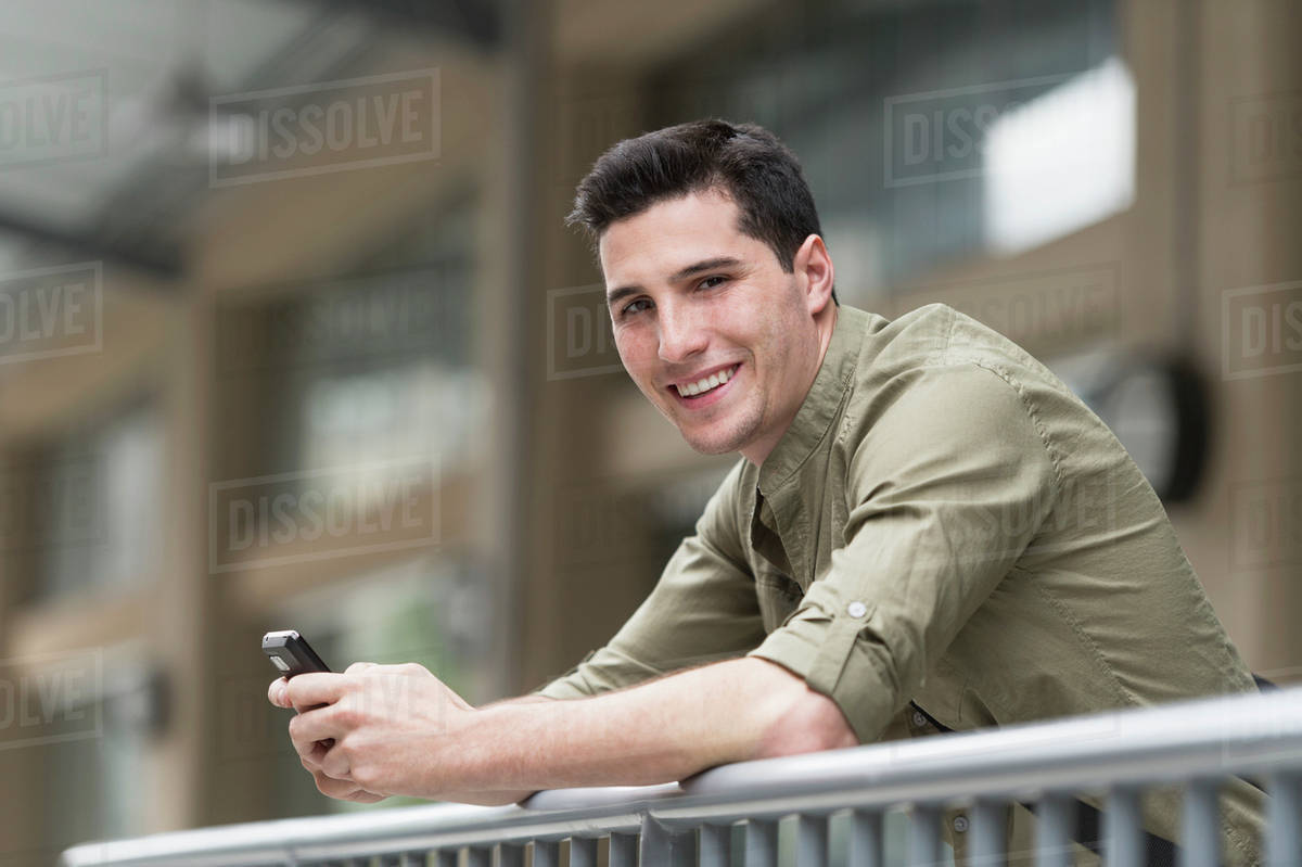 Man text messaging - Stock Photo - Dissolve